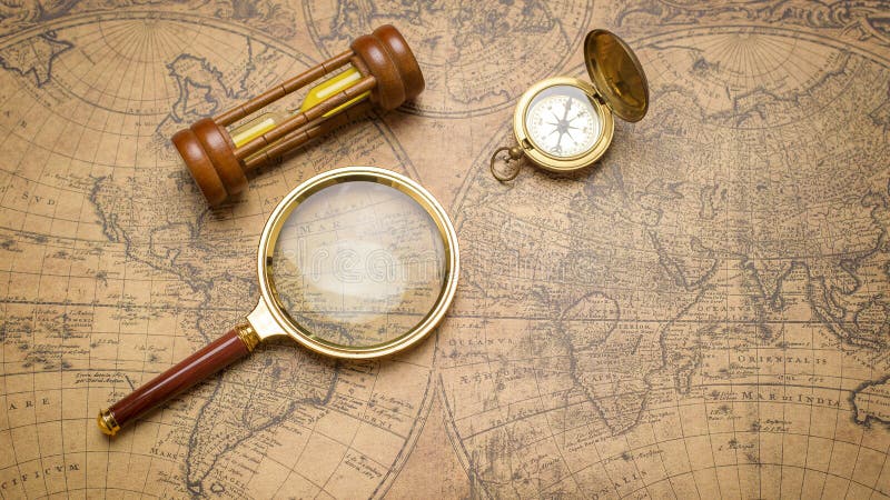 Old Compass , Magnifying Glass and Sand Clock on Vintage Map Stock ...
