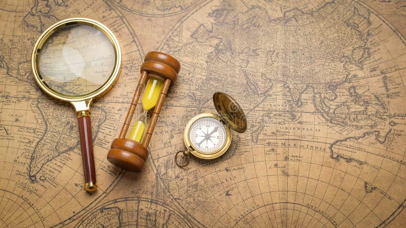 Old Compass , Magnifying Glass and Sand Clock on Vintage Map Stock ...