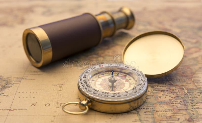 Old Compass and Old Telescope on Vintage Map World Explorer Concept ...