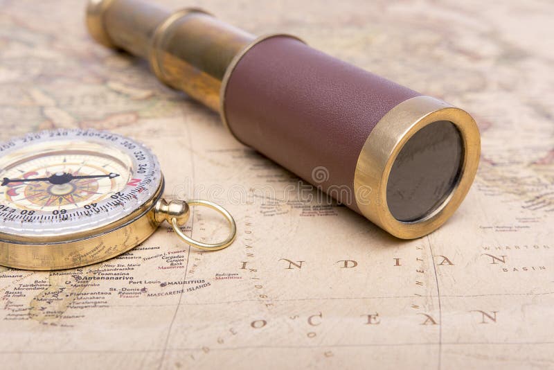 Old Compass and Old Telescope on Vintage Map World Explorer Concept ...