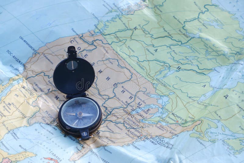 Old Compass on the Russian-language Map of the World. Concept Stock ...