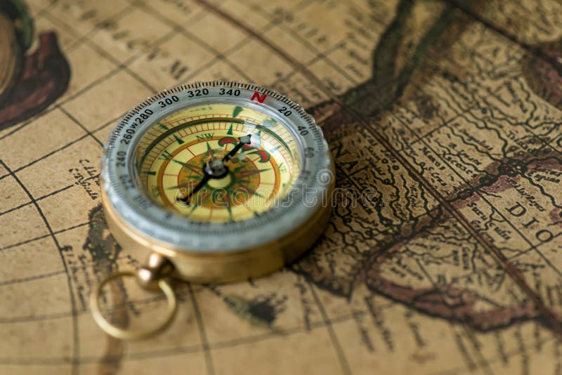 Old compass on vintage map stock image. Image of navigate - 111902611
