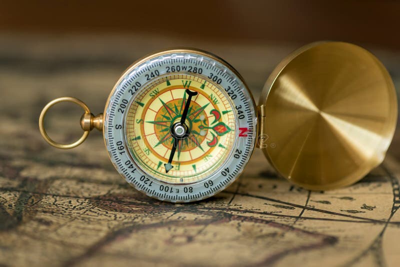 Old compass on vintage map stock image. Image of nautical - 111902563