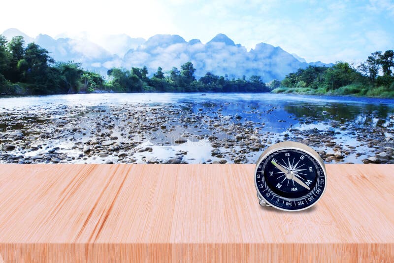Old Compass on Wood Walk and River with Sky. Stock Photo - Image of ...