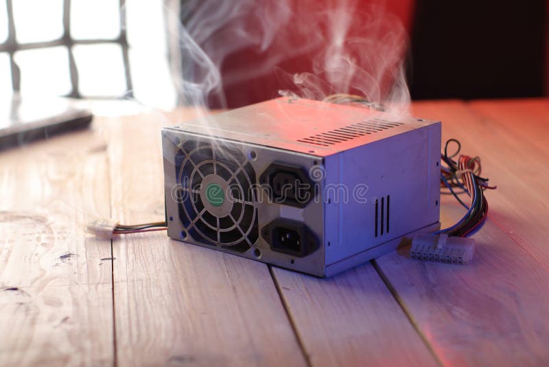 Old Computer Power Supply Burning on the Table Stock Image - Image of ...