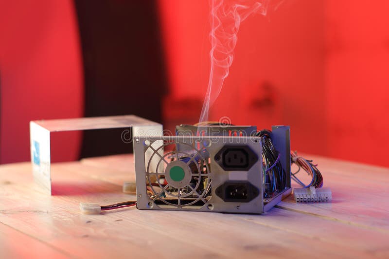 Old Computer Power Supply Burning on the Table Stock Image - Image of ...