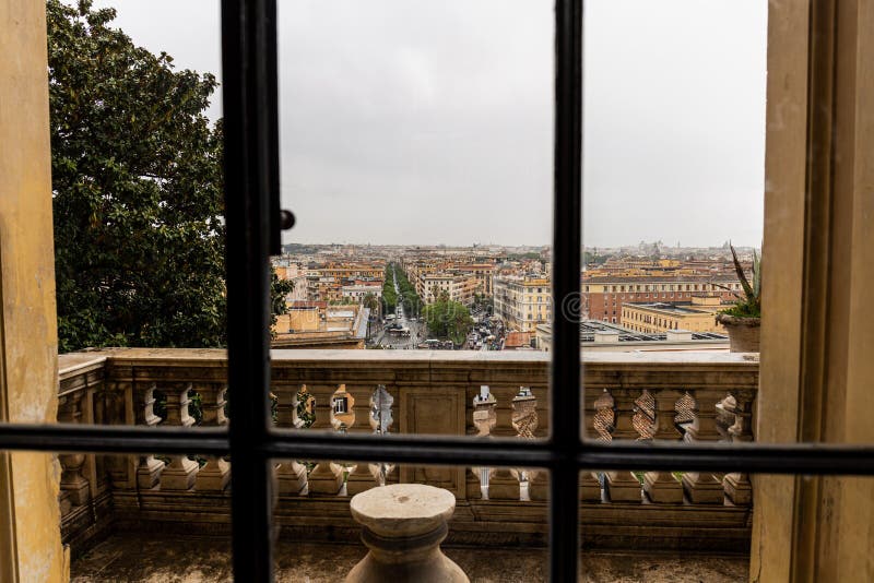 Old Concrete Balcony Behind Window in Rome Stock Image - Image of trees ...