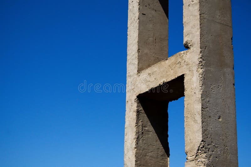 Old Concrete Structure Against a Bright Blue Sky Stock Photo - Image of ...