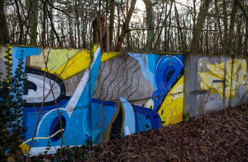 Old Concrete Wall in the Forest with Graffiti Background Editorial ...