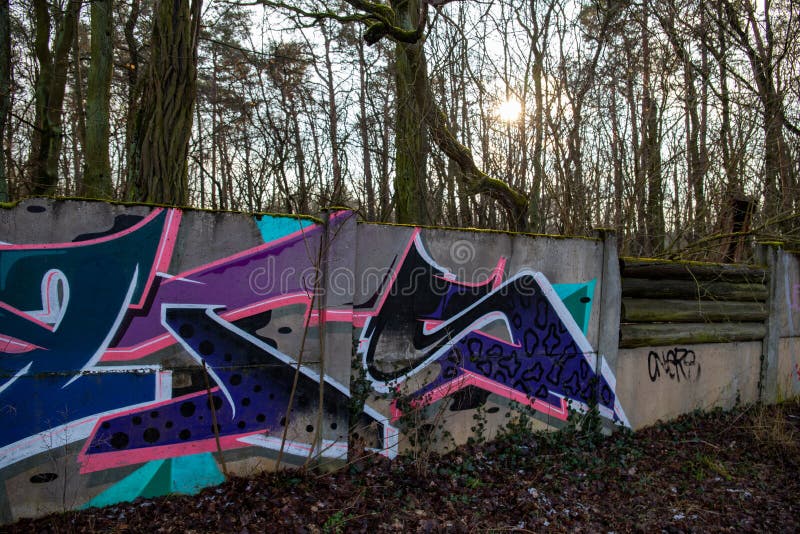 Old Concrete Wall in the Forest with Graffiti Background Editorial ...