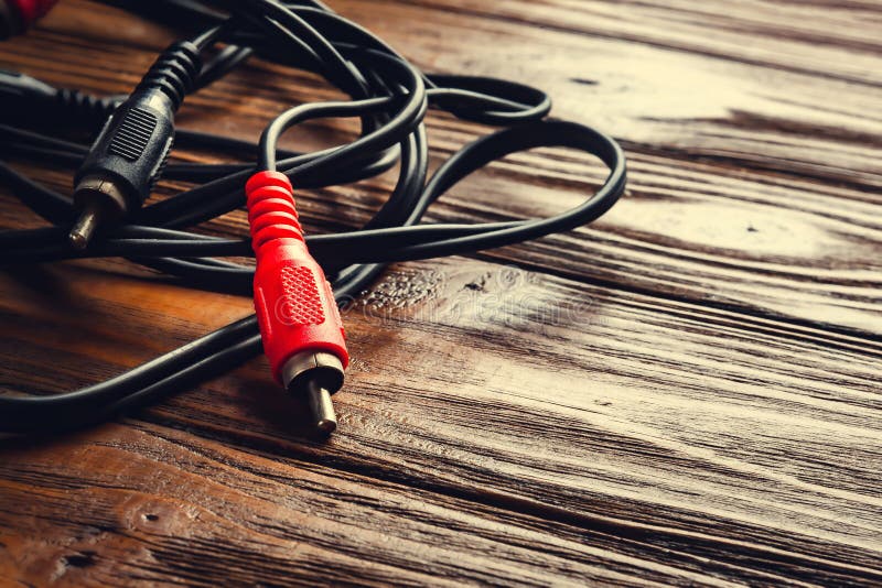 Old Connecting Audio Cables. Wires on a Wooden Surface Stock Image ...