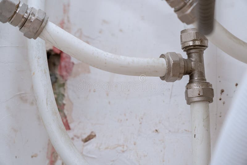 Old Connection Fitting Tee on Plastic Pipes Stock Photo - Image of ...
