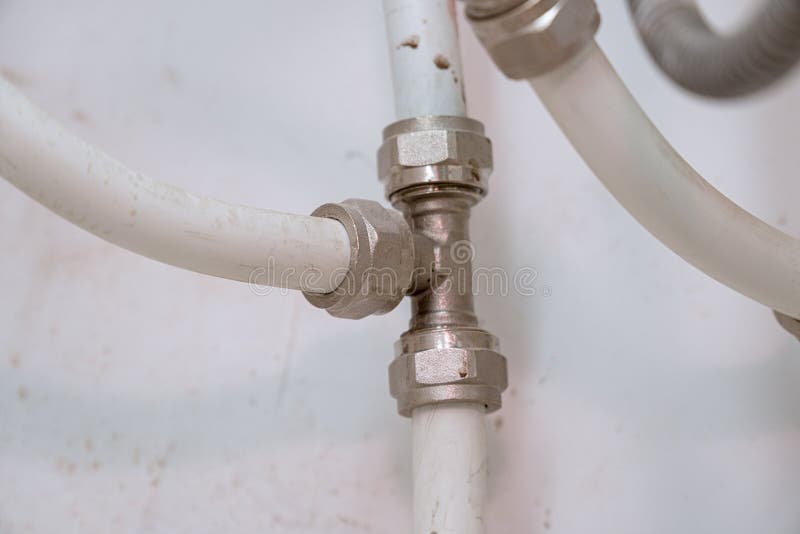 Old Connection Fitting Tee on Plastic Pipes Stock Photo - Image of ...