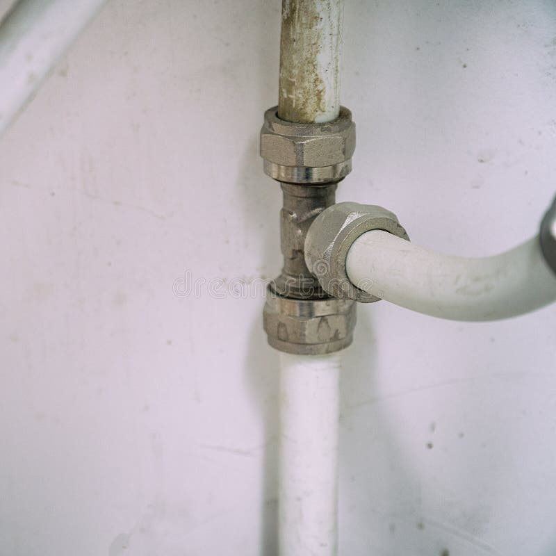 Old Connection Fitting Tee on Plastic Pipes Stock Photo - Image of ...