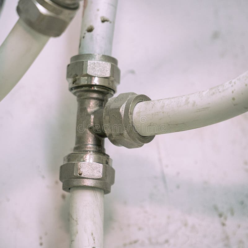 Old Connection Fitting Tee on Plastic Pipes Stock Image - Image of ...