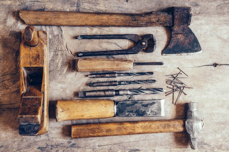 Old Construction Tools on a Wooden Workbench Flat Lay Background ...