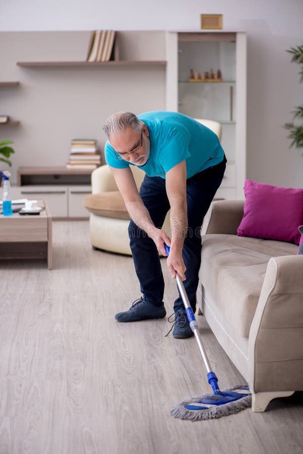 Old Male Contractor Cleaning the House Stock Photo - Image of dust ...