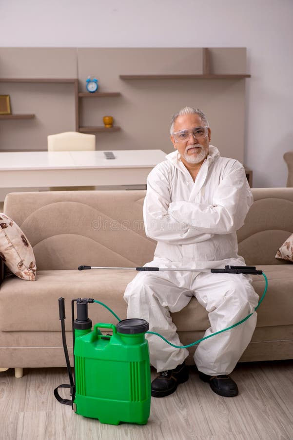 Old Male Contractor Doing Pest Control at Home Stock Image - Image of ...