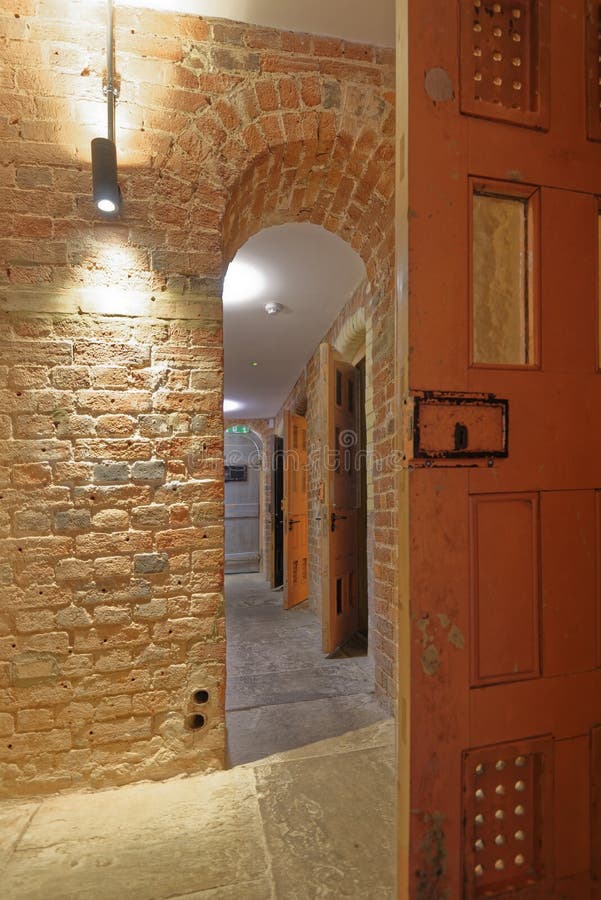 Old converted prison cells stock photo. Image of lock - 235125774