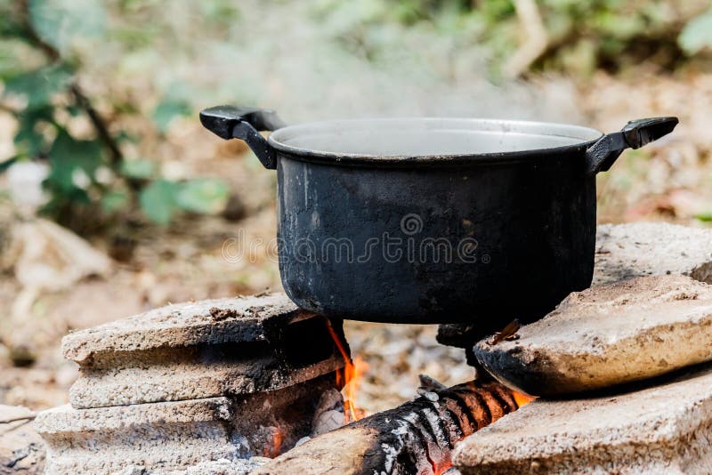 Old Cooking Pot Stove Using Firewood. Stock Photo - Image of rural ...