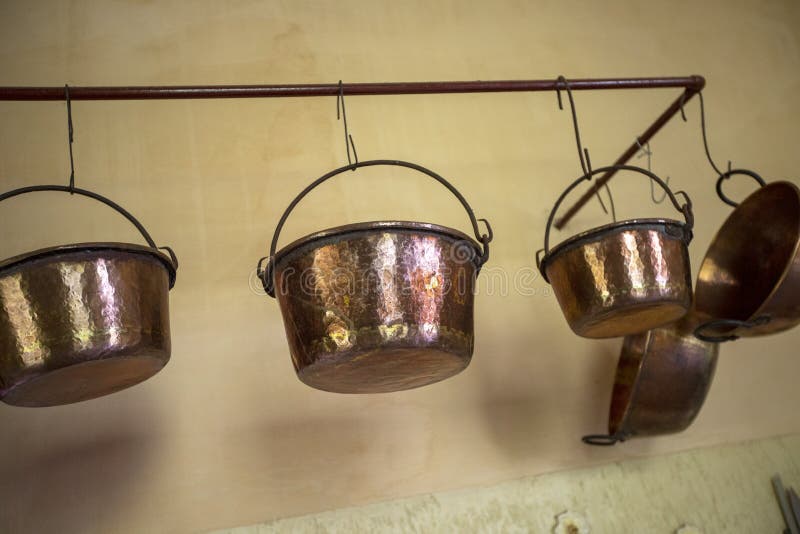 Old Copper Pots Hanging in the Kitchen Stock Photo - Image of bazaar ...