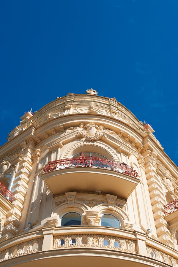 Old Corner Building with Stone Balconies Against a Sky Stock Photo ...