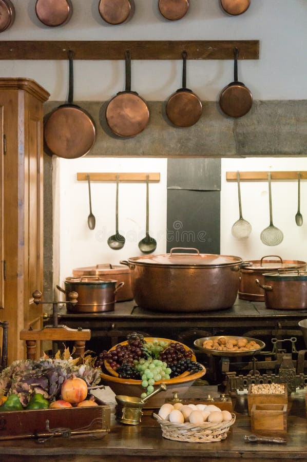 Old Copper Pots and Pans in Aged Antique Kitchen Stock Photo - Image of ...