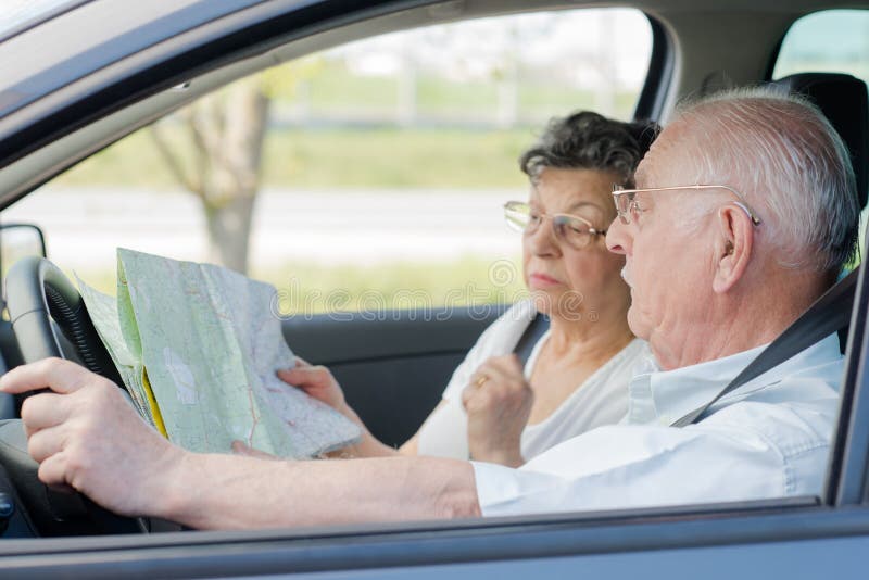 Old Couple Driving Around with Map Stock Image - Image of retirement ...