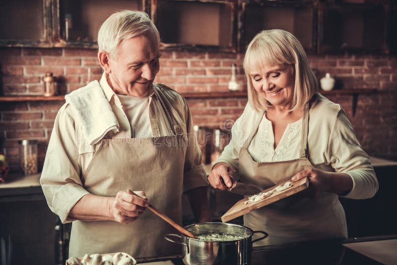 Old couple in kitchen stock image. Image of ingredient - 97136501