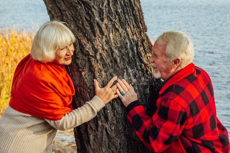 Old Couple Is Walking In The Green Park Fifty Years Together Love