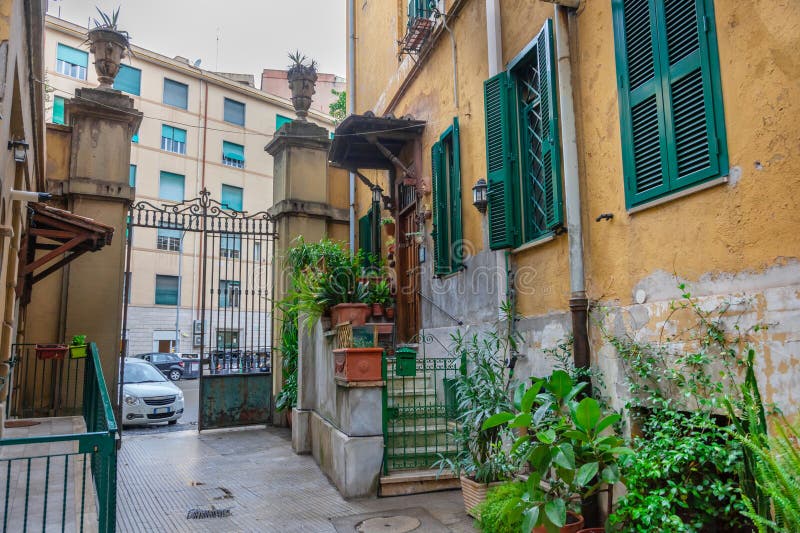 Old courtyard in Rome stock photo. Image of roman, motorbike - 275150232