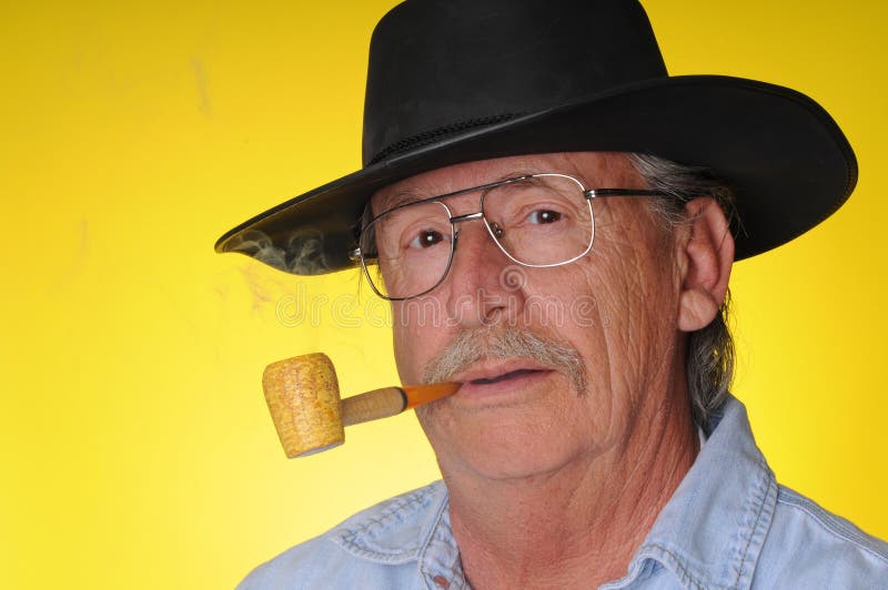 Old Cowboy and Pipe stock image. Image of country, mystery - 15202223