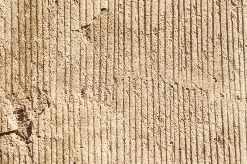 Old Cracked Beige Concrete Wall with an Old Relief. Stock Image - Image ...