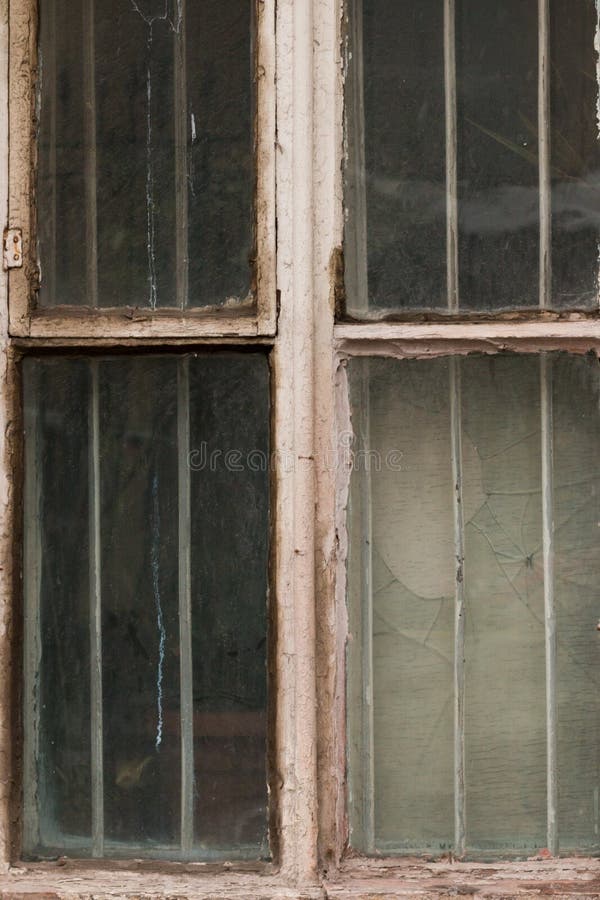 Old Cracked and Broken Window in an Industrial Mill. Stock Image ...