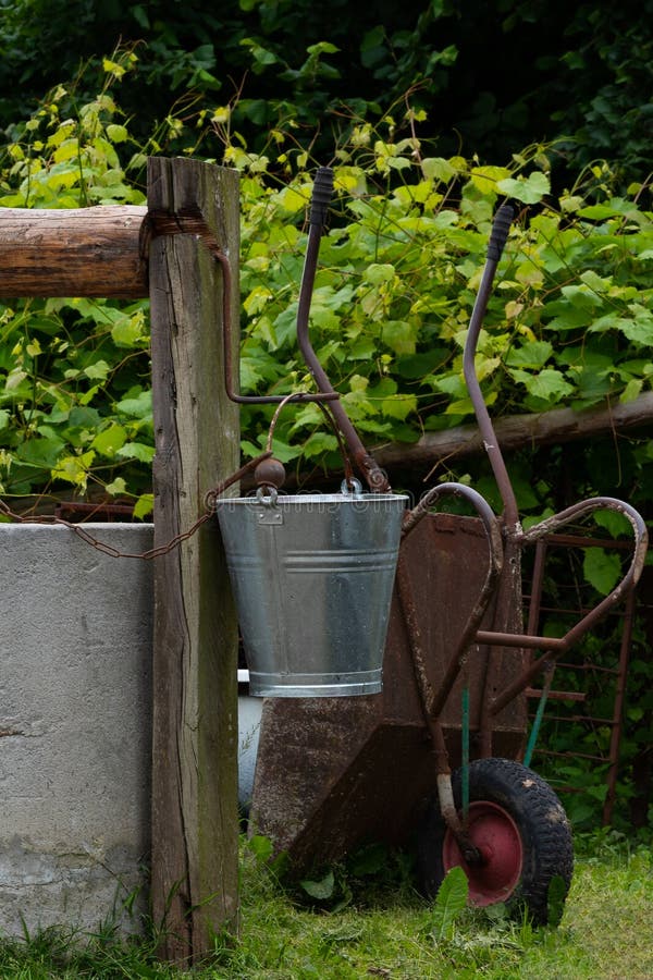 Old crank well in village stock image. Image of wooden - 249557765