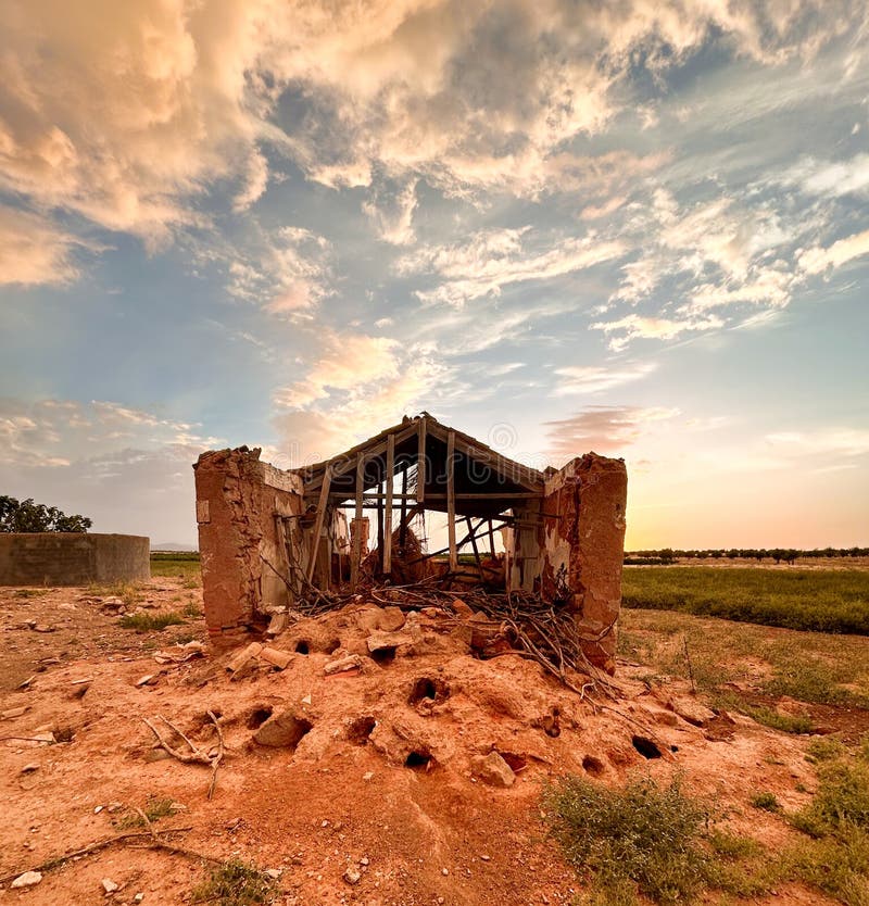 An Old and Crumbling Building Sits in the Middle of Nowhere Stock Photo ...