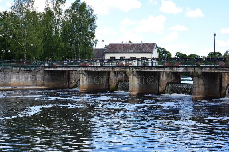 Pedestrian Bridge and River Dam in the Summer Day Stock Photo - Image of water, overflow: 365096888