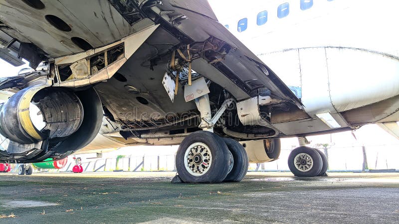 Old and Damaged Aircraft Parked in the Hangar Stock Photo - Image of ...
