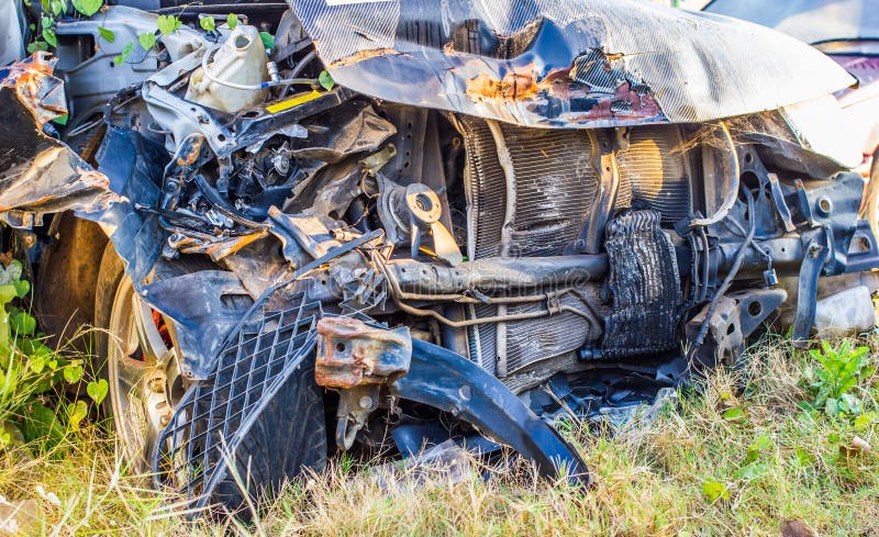 Old Damaged Rusty Car Wreck in the Grass Stock Image - Image of motor ...
