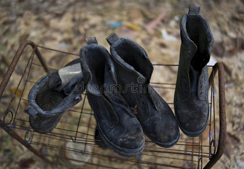 Old Damaged Work Rubber Boots Stock Photo - Image of rancid, dirty ...