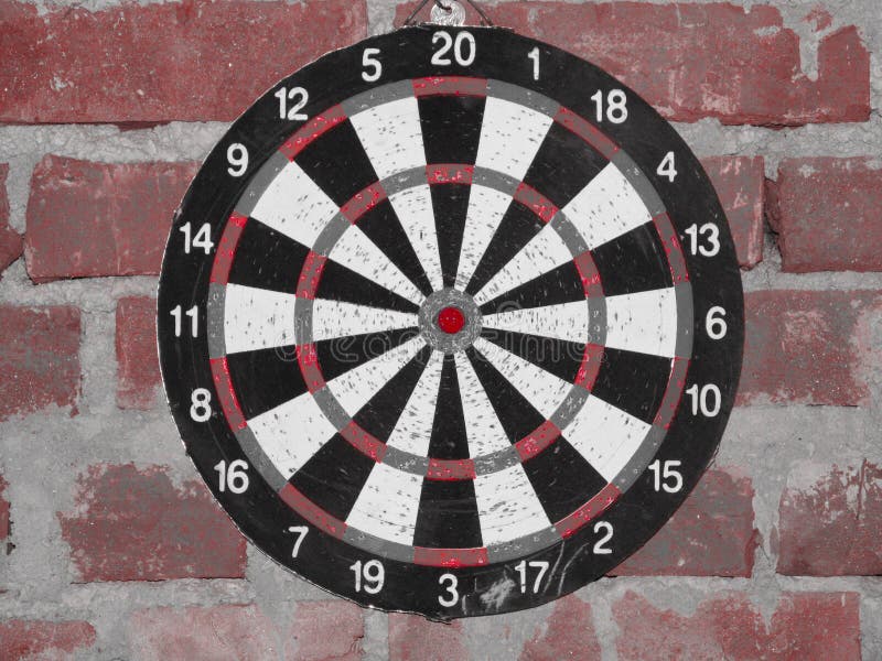 An Old Dart Board Hanging on the Wall Stock Image - Image of flooring ...