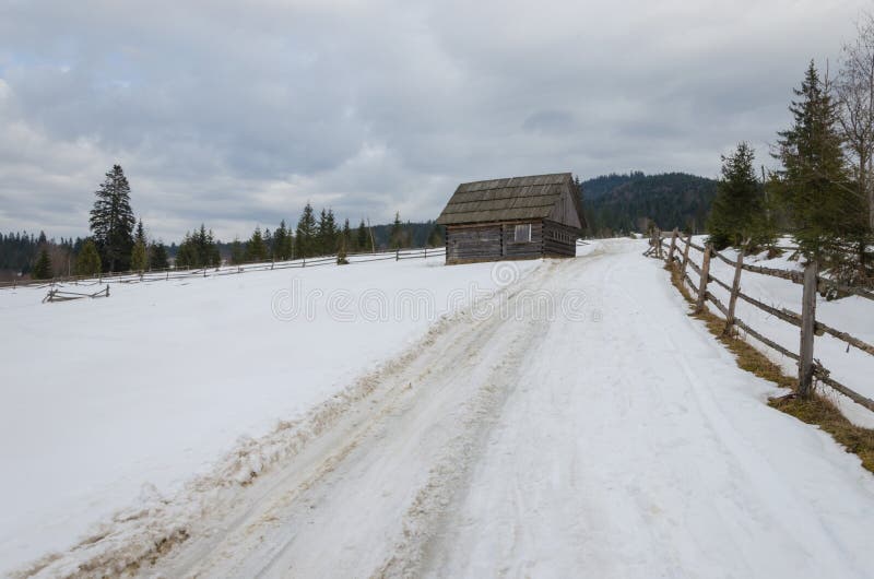 Old Decrepit Wooden Building in Snow-covered Mountains Stock Photo ...