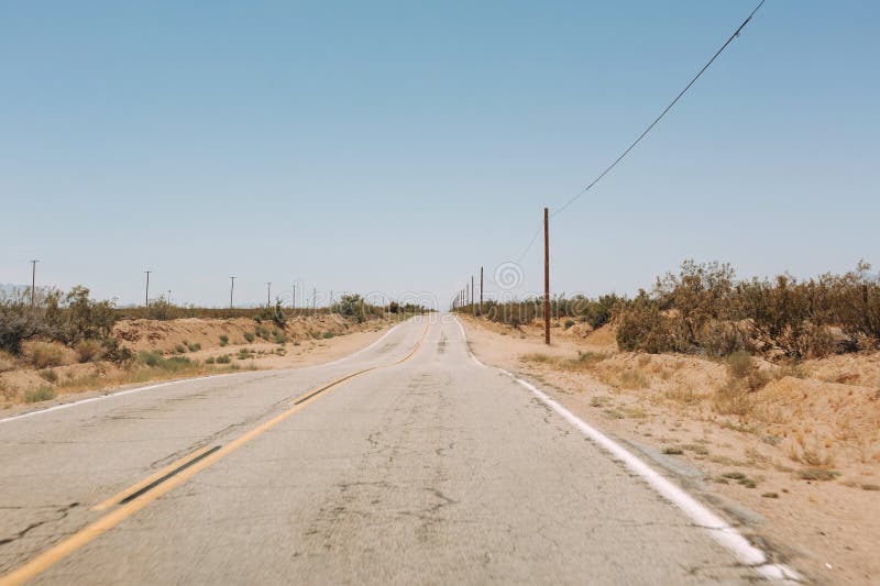 An Old Desert Road in California. Panoramic View with an Empty Road ...