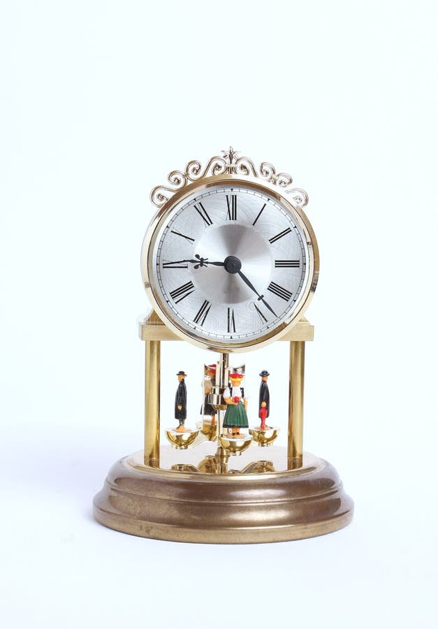 Old Desk Clock Resting on a Wooden Table is Displaying the Time Stock ...