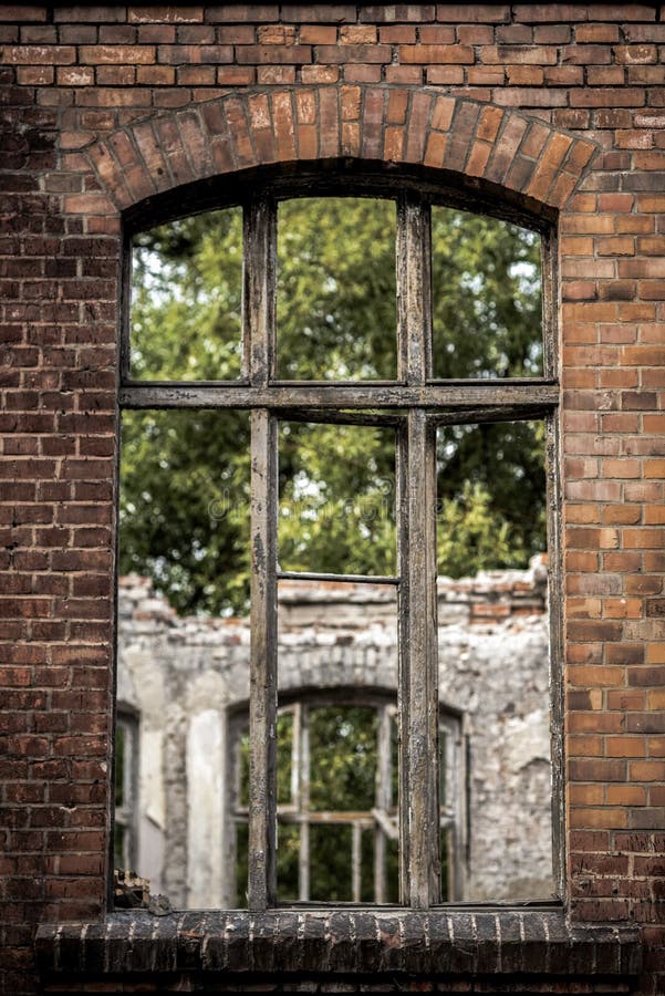 Old Destroyed Window with Broken Windows in a Brick Wall. Stock Image ...