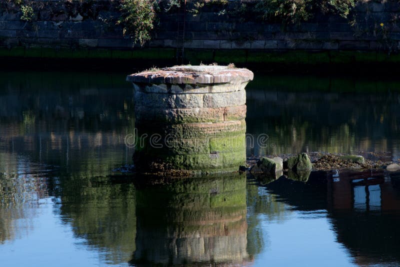 Old Dilapidated Bridge Pier in a River Stock Image - Image of leaves ...