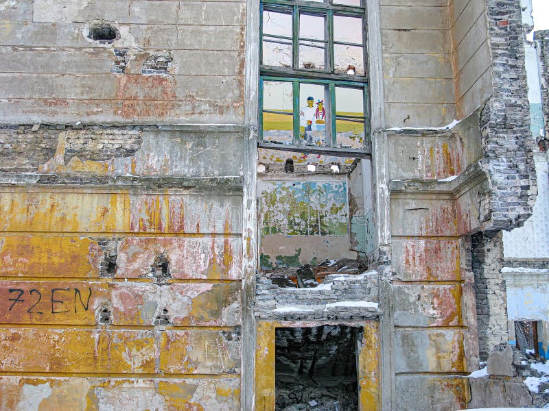 An Old, Dilapidated Building with Weathered, Damaged Structure, Visible ...
