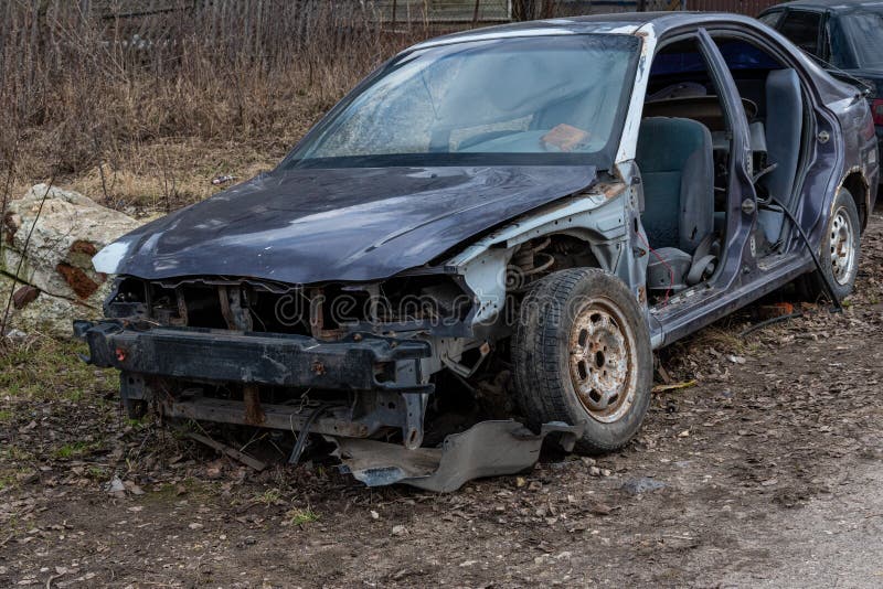 Old Dilapidated Car Abandoned on the Side of the Road Stock Photo ...