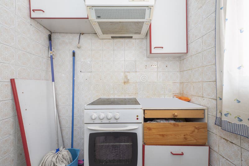 Old Dilapidated Kitchen Front with Old Tiles Stock Photo - Image of ...