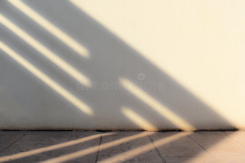 Old Dirty Cream Painted Concrete Wall and Footpath with Sunlight Shadow ...